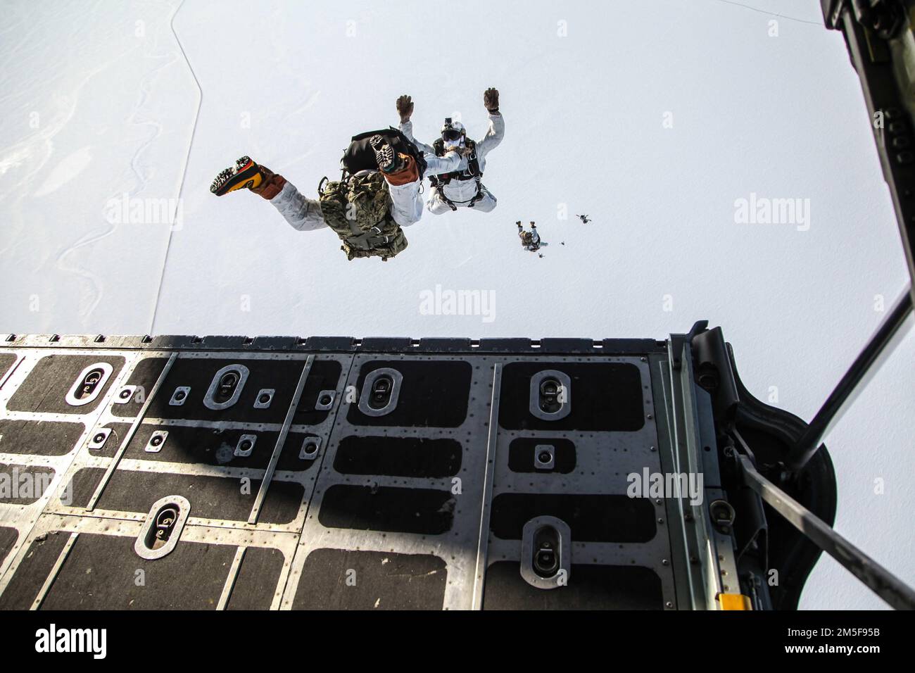 U.S. Navy SEALs conduct High Altitude Low Opening (HALO) airborne ...