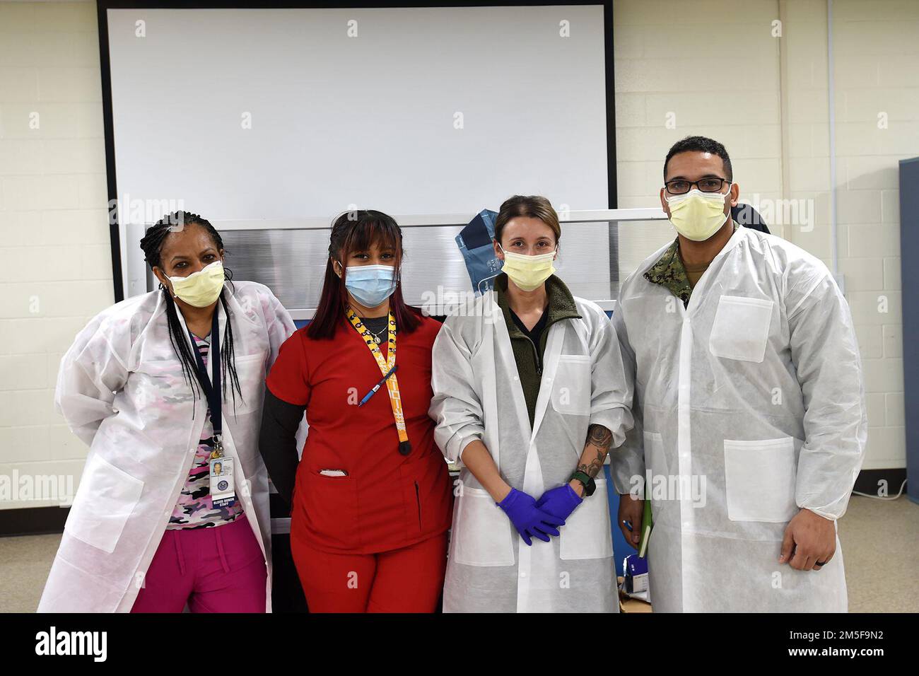 Staff from the Armed Service Blood Program pause for a photo during a ...