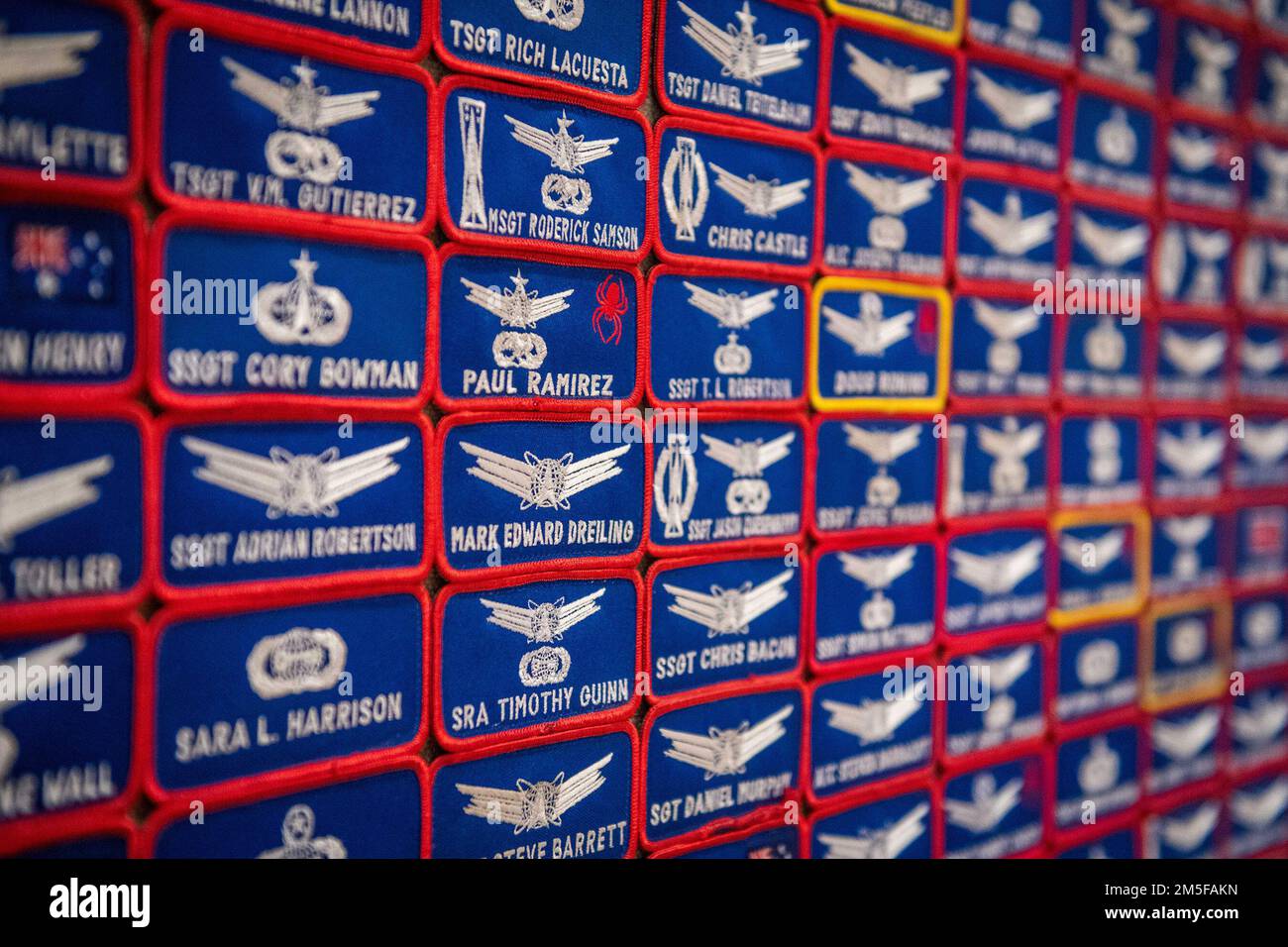 A board of patches representing the current and prior members of the ...