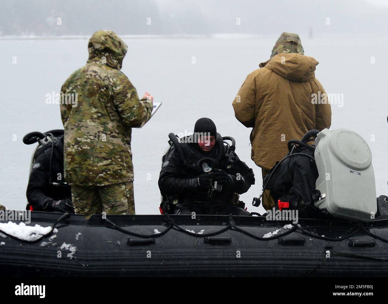 Navy explosive ordnance disposal technicians, assigned to Explosive ...
