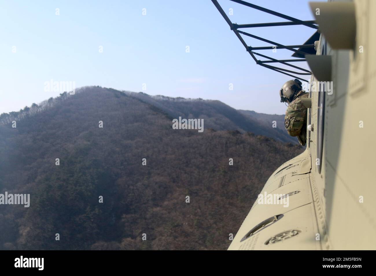 Soldier assigned to 3-2 General Support Aviation Battalion searches for ...