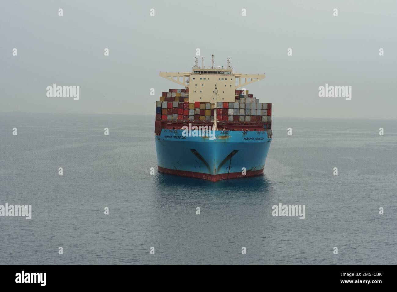 Huge blue container vessel from shipping company Maersk Lines anchored ...