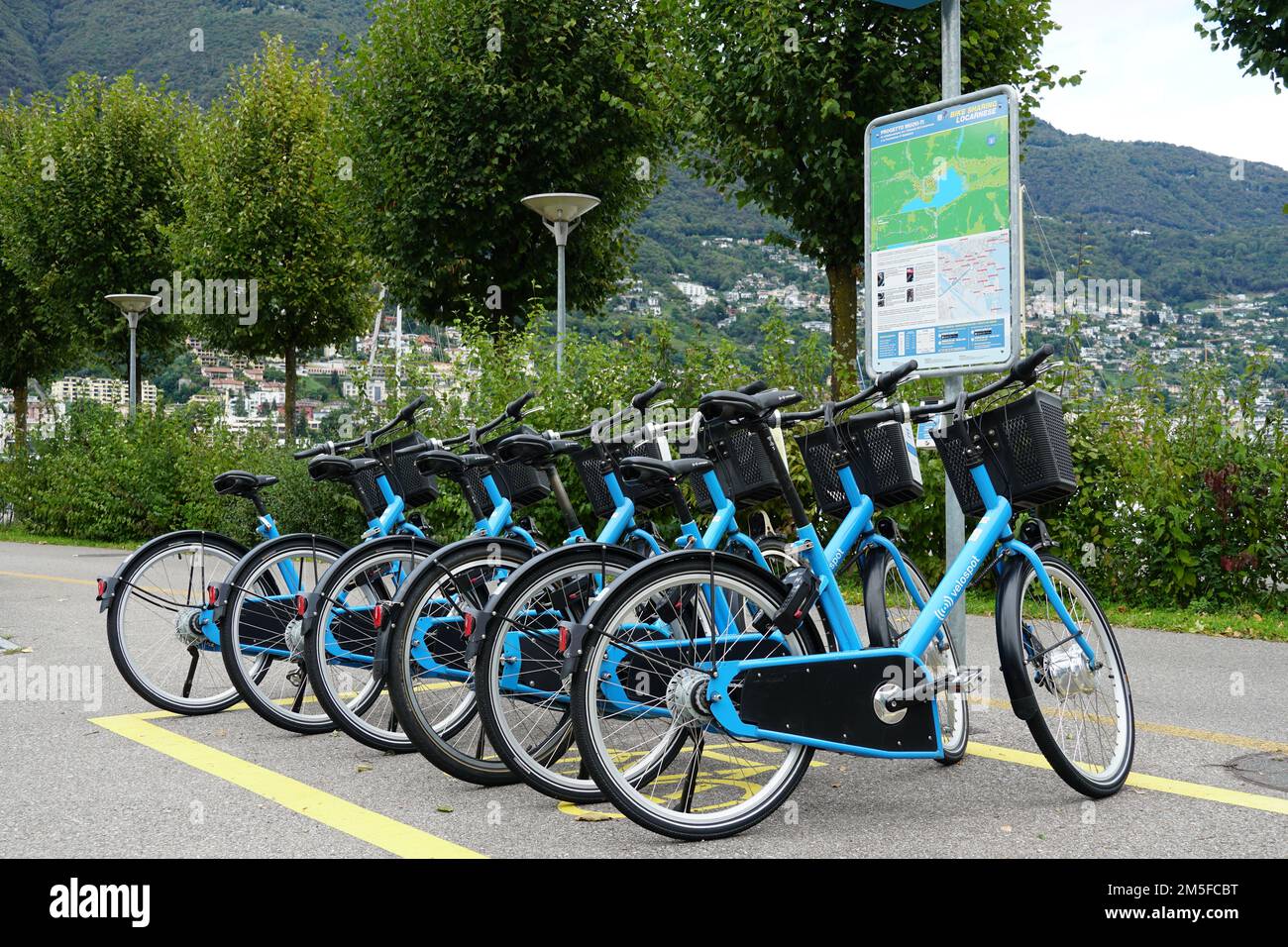 Blue E-bikes used in sharing system activated by card or mobile phone ...