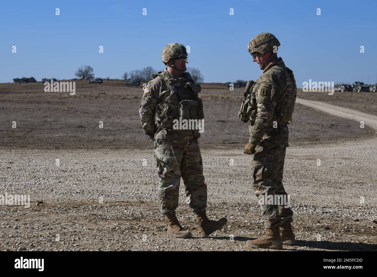 U.S. Army Col. Daniel Miller, left, commander of 41st Field Artillery ...