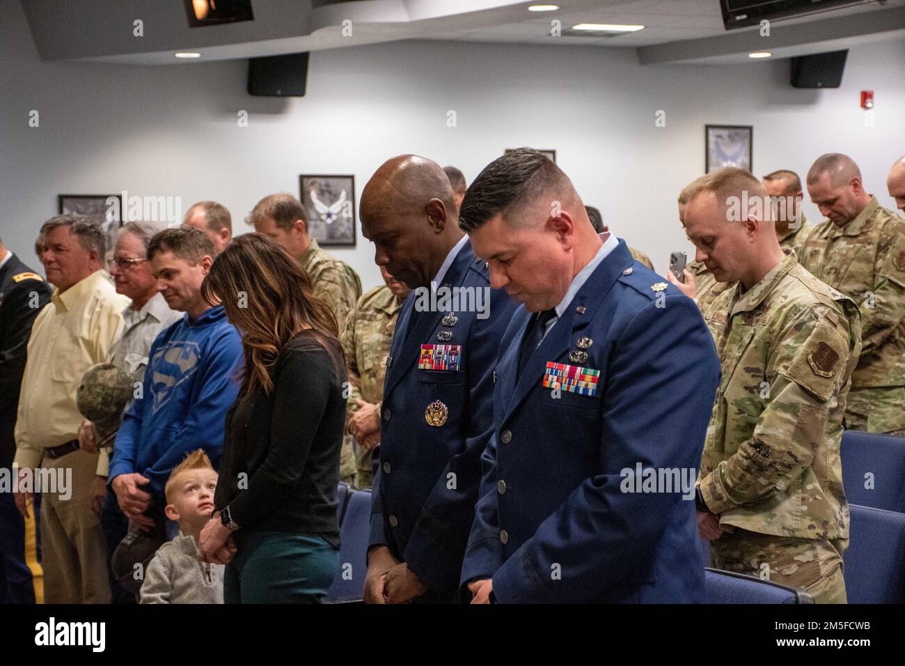 Members of the Nevada Air National Guard bow their heads during the ...