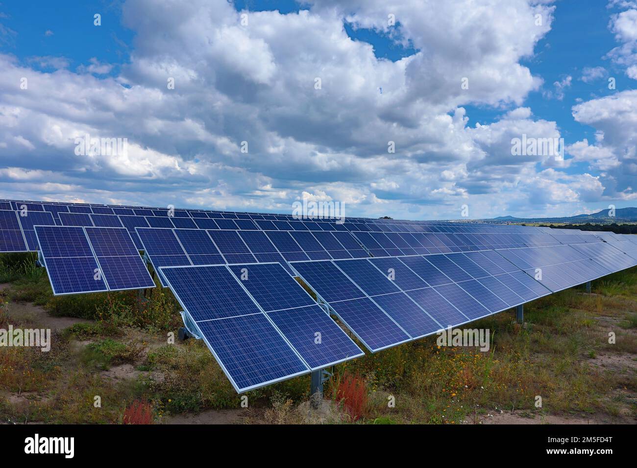 The solar panels, photovoltaic modules reflecting the light from sun ...