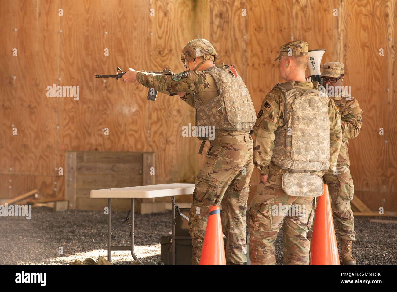 A competitor aims his rifle during the stress shoot event of the 2022 ...