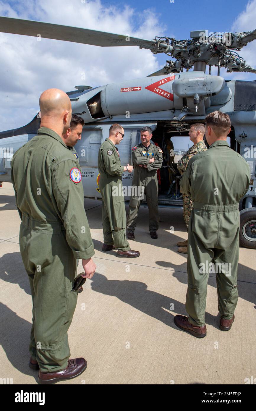 U.S. Marine Corps Col. Nathan S. Marvel, center-left, commanding ...