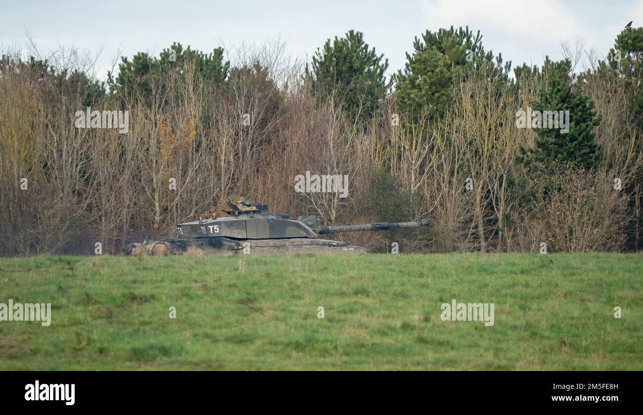 The military tanks moving in a field Stock Photo - Alamy