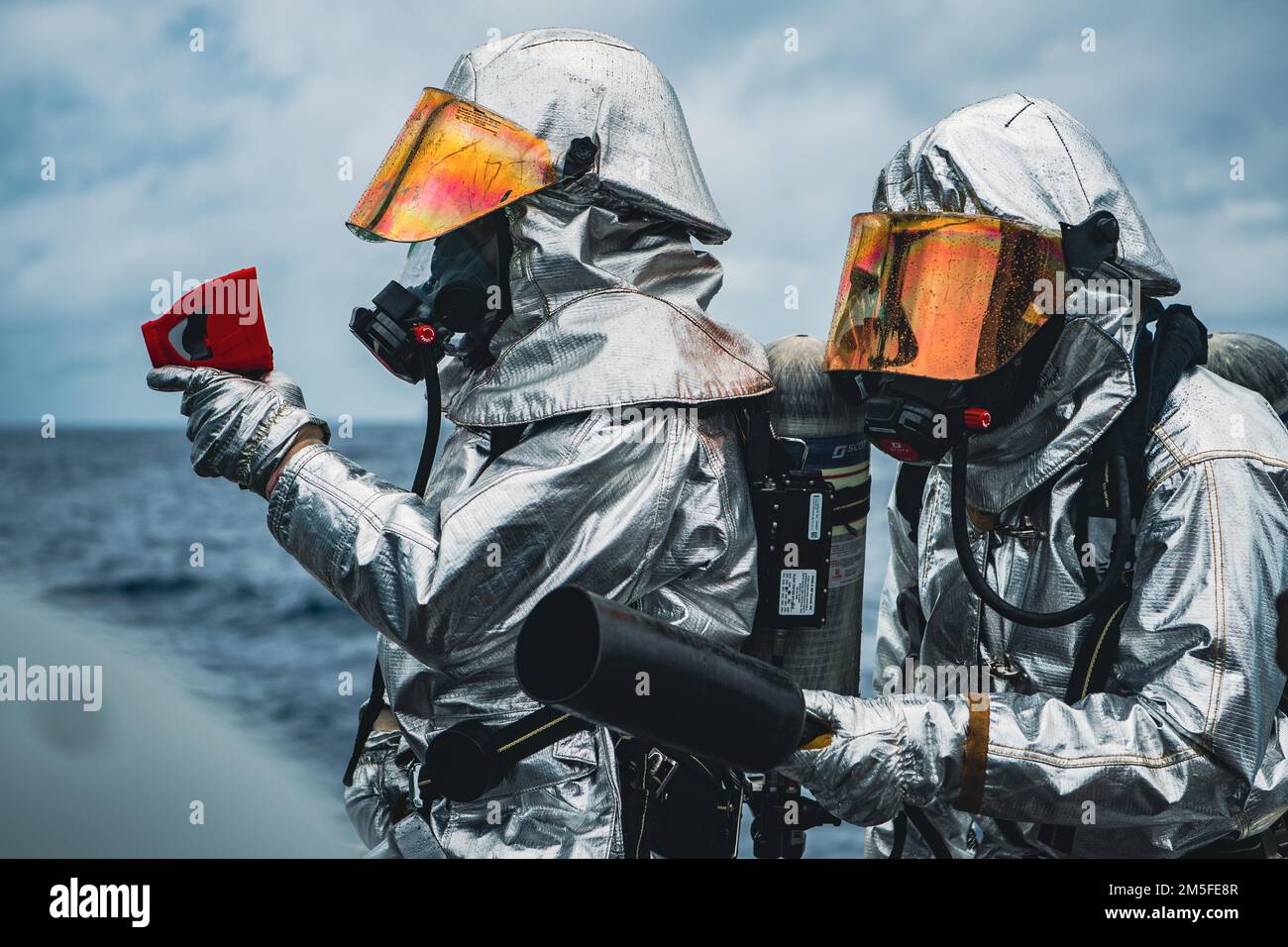 220303-N-TT059-1049 SOUTH CHINA SEA (Mar. 12, 2022) Damage Controlman ...