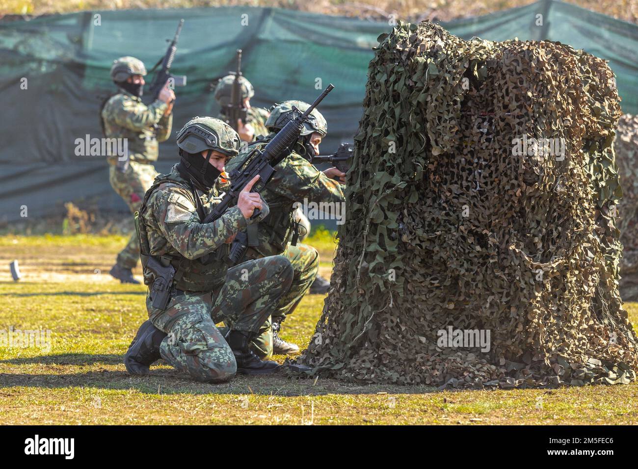 Albanian Special Forces soldiers exhibit their rifle marksmanship ...