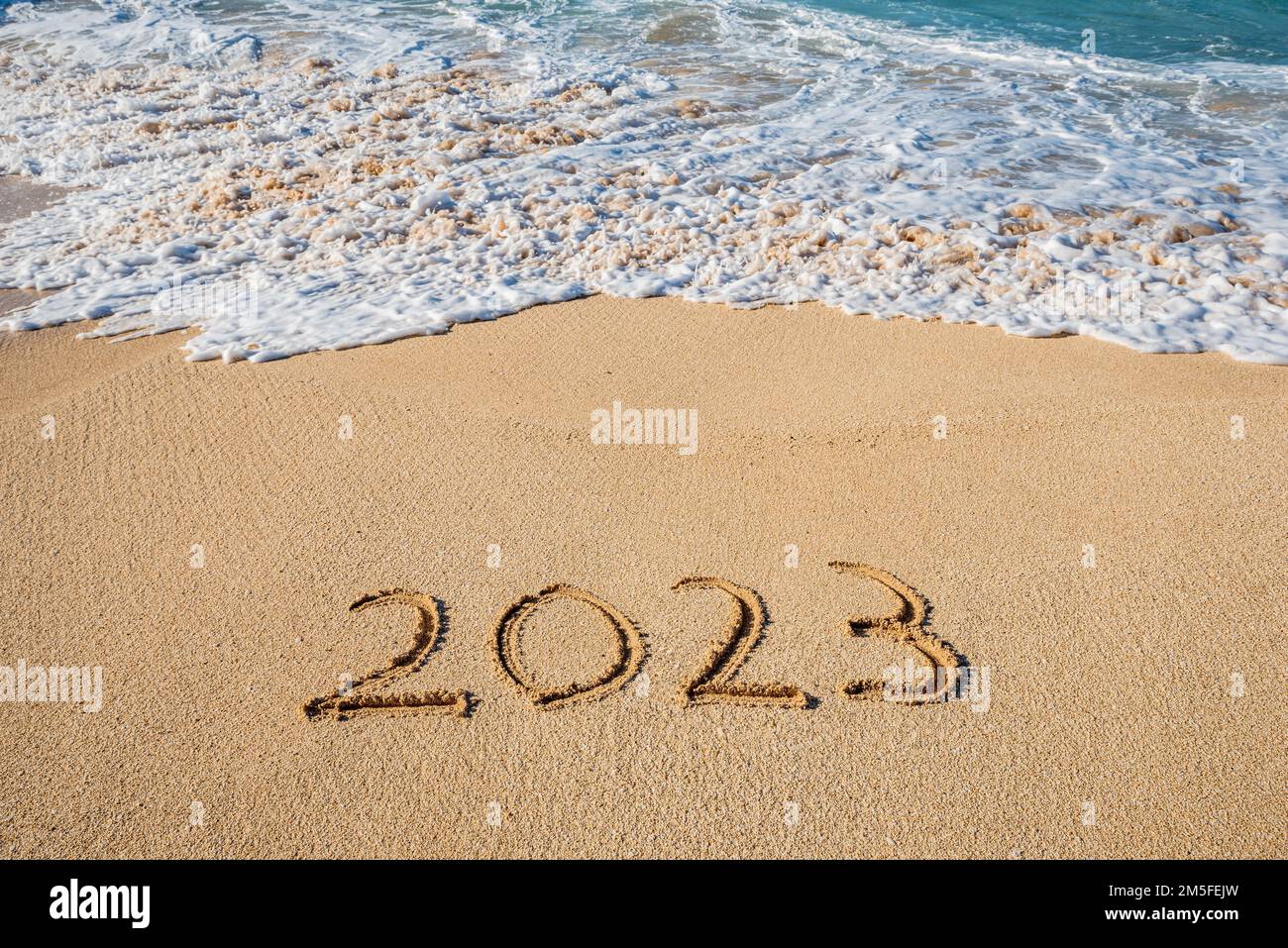 Year 2023 written in the sand hi-res stock photography and images - Alamy