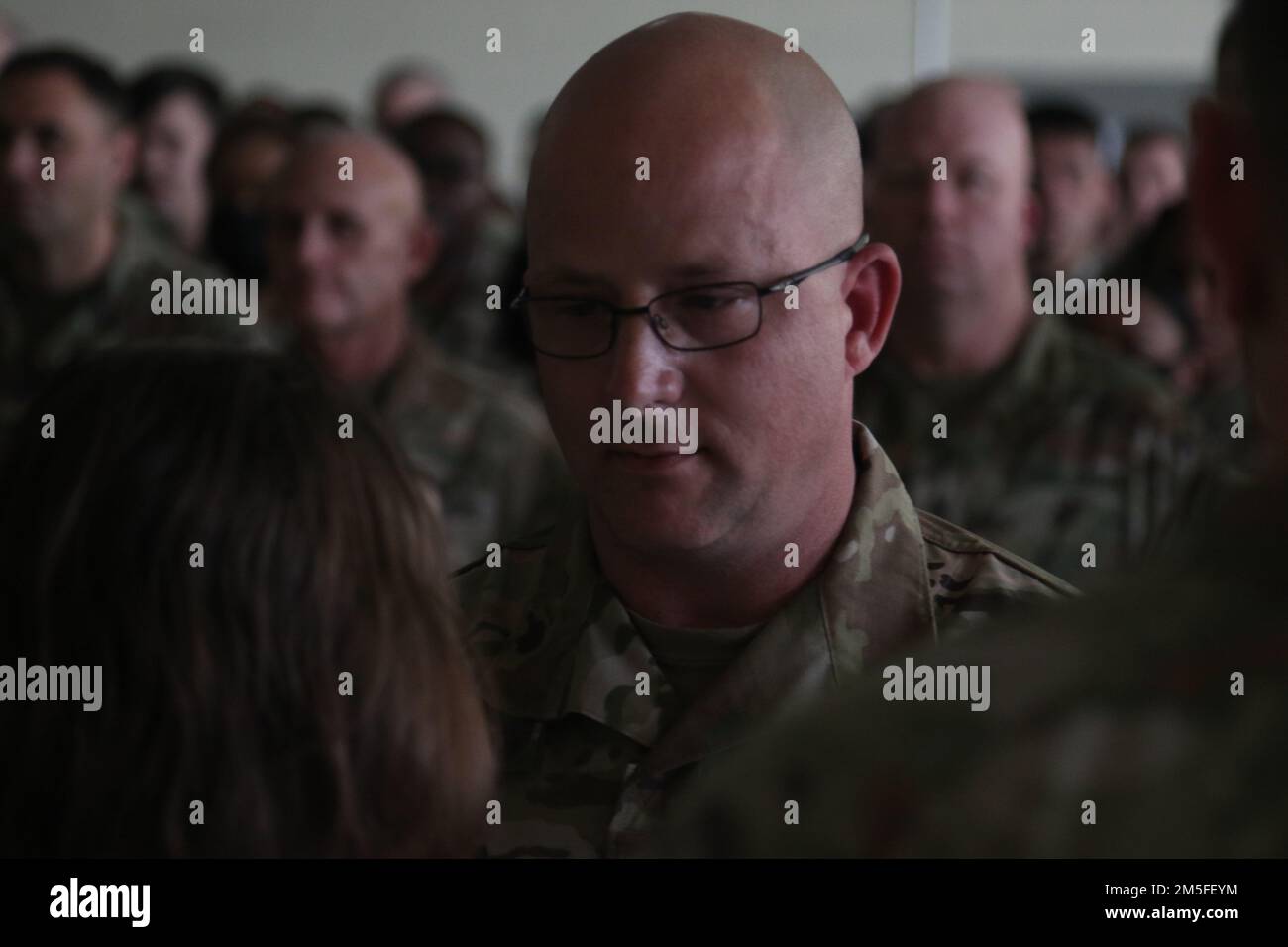Staff Sgt. Brian McHenry's daughter pins the new rank on her father ...