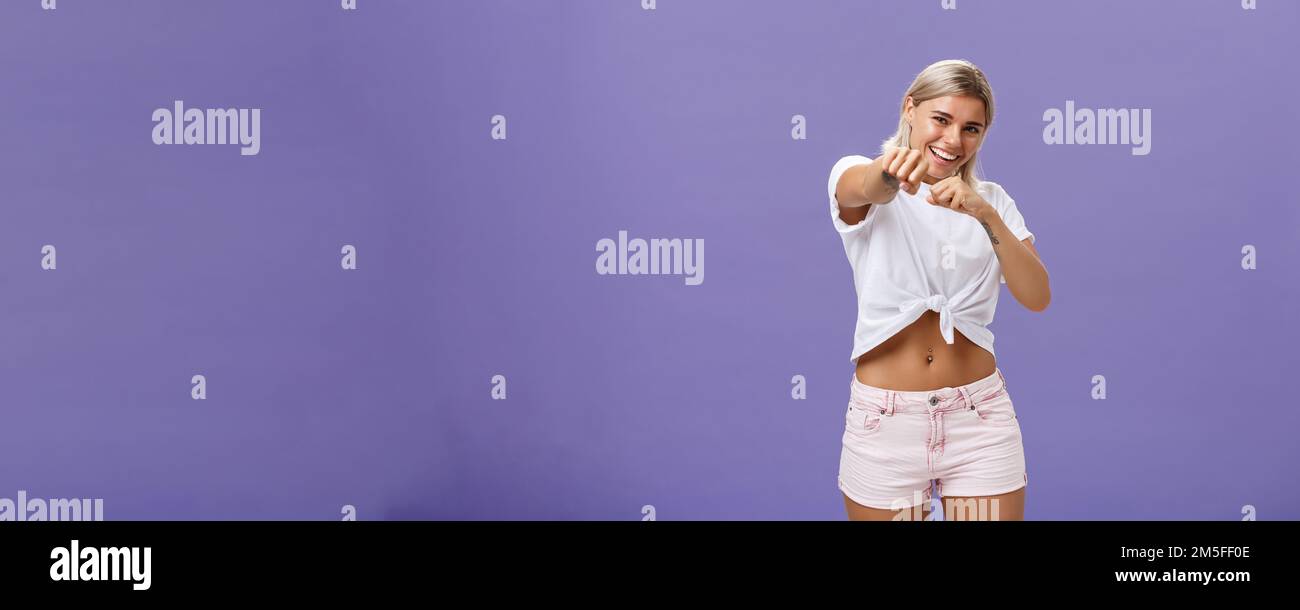 Ready fight back. Energized happy and awesome blonde female with tanned ...