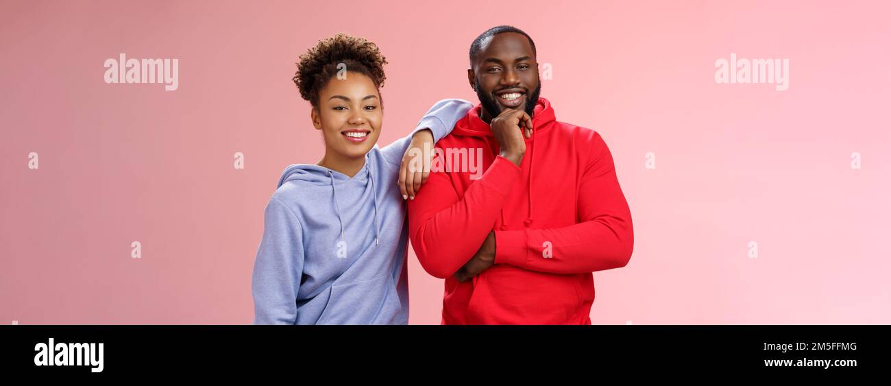 Romantic couple best friends standing pink background girl leaning ...