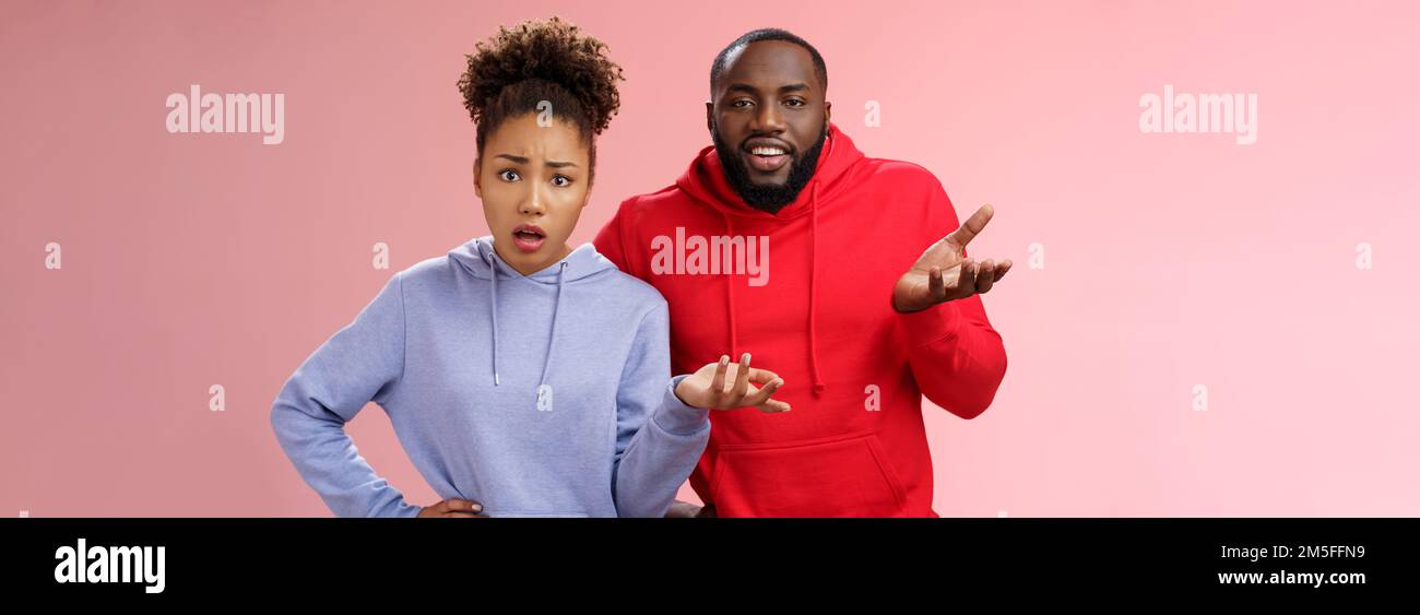 What hell are you doing. Portrait shocked confused clueless two african ...