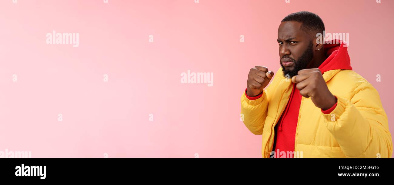 Serious-looking angry irritated young black bearded man pissed rude ...