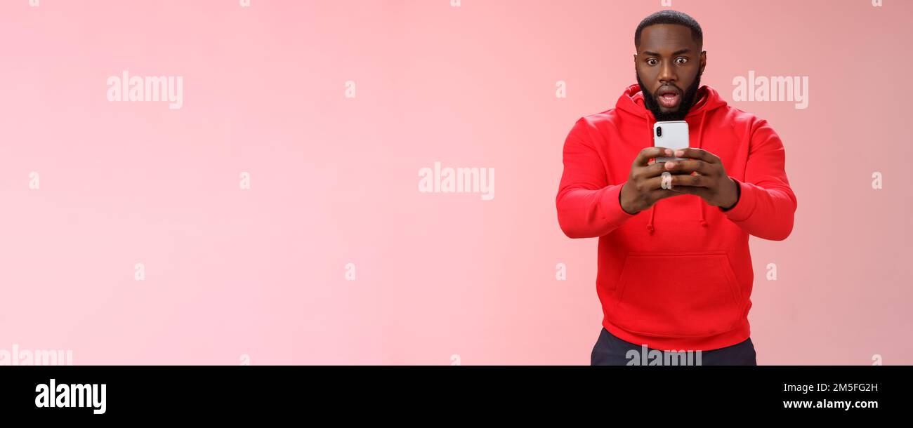 Wow hold on let take picture. Portrait impressed surprised shocked man ...