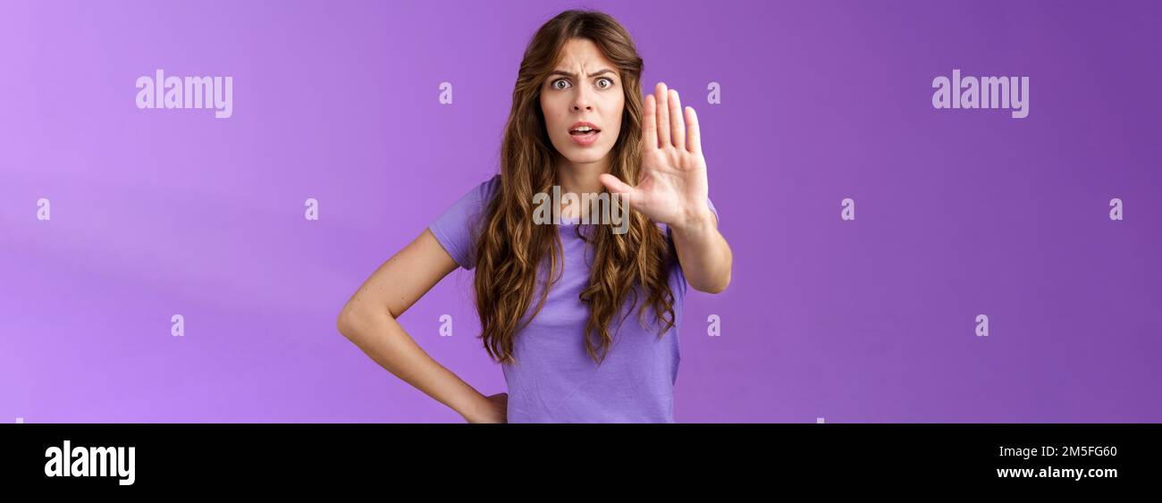 Serious-looking displeased assertive female friend stand confident ...