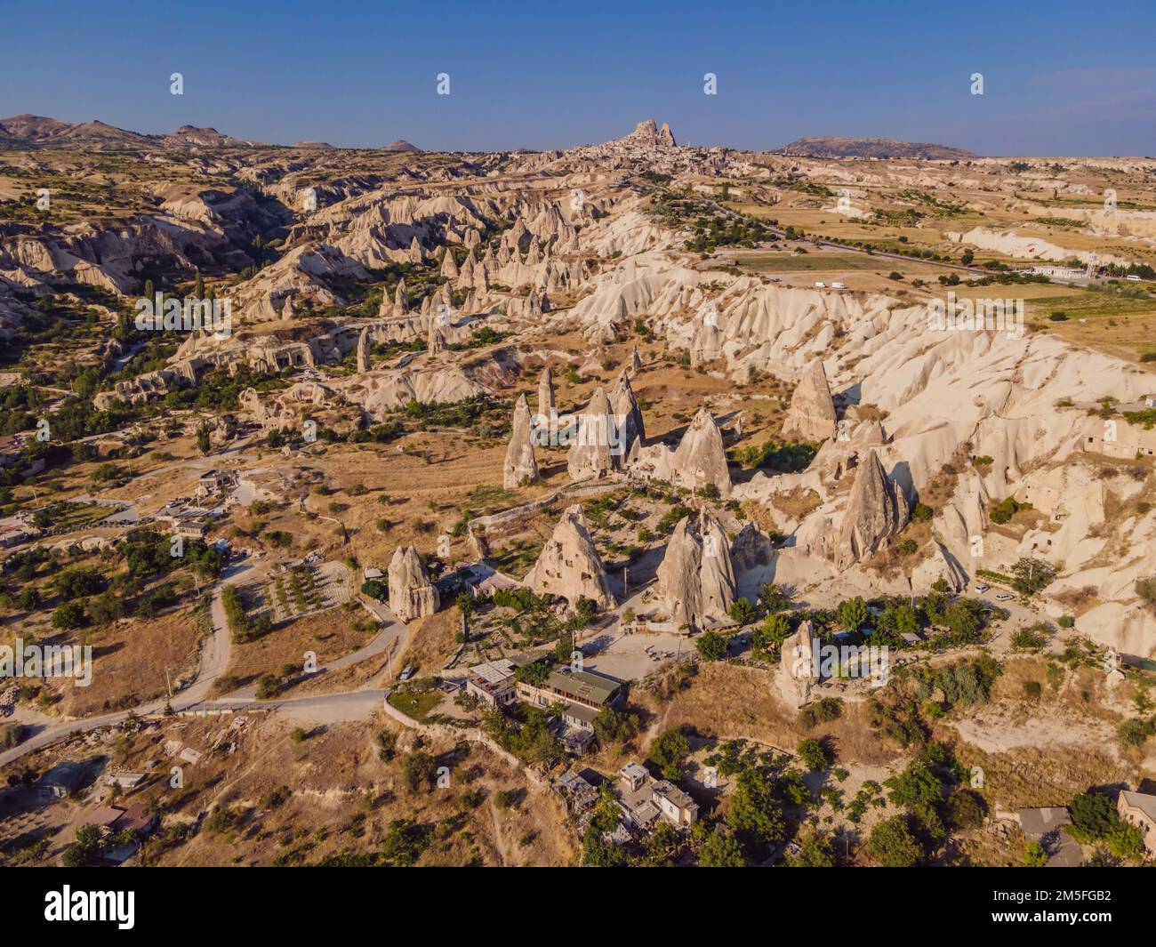 Colorful hot air balloons flying over at fairy chimneys valley in ...