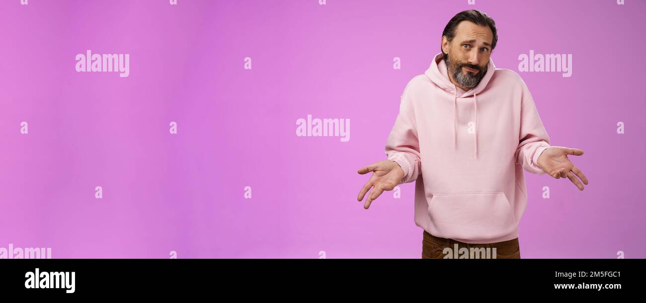 Portrait clueless unaware father cringing smirking uncertain shrugging ...