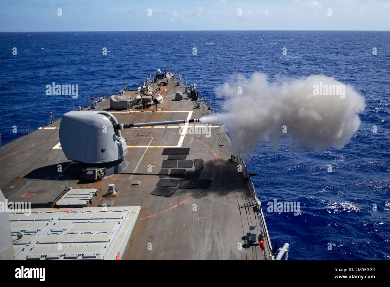 220312-N-KW492-1020 PACIFIC OCEAN (March 12, 2022) A Mark 34 5-inch gun ...