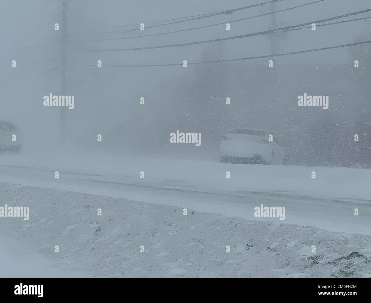 Lancaster, New York, USA. 24th Dec, 2022. Vehicles are left stranded on ...