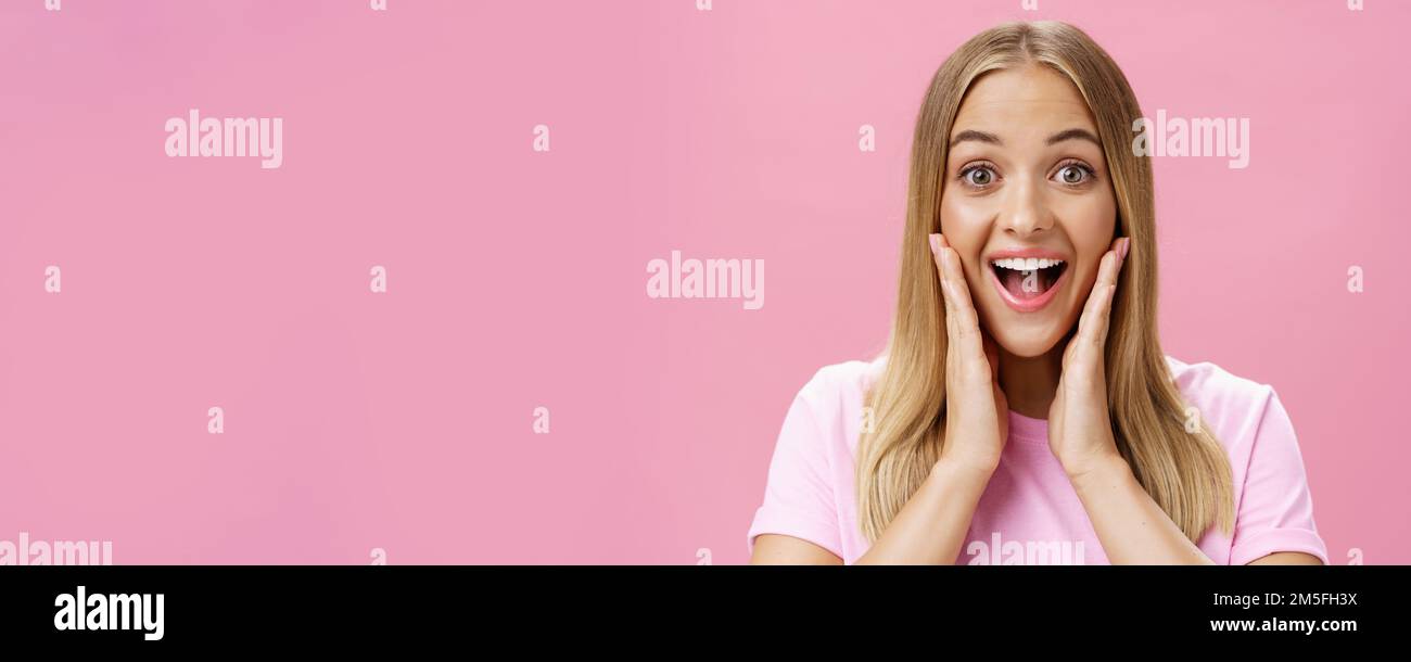 Woman surprised to see own face without imperfactions treating acne ...