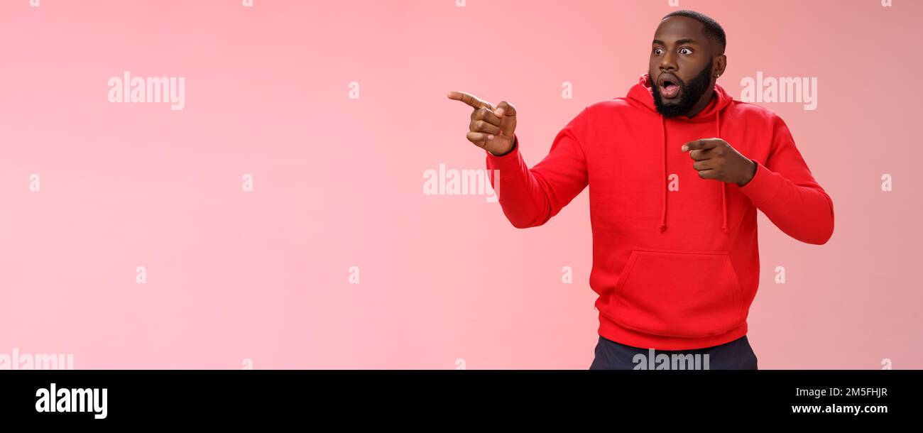 Shocked stunned man widen eyes gasping drop jaw standing stupor ...