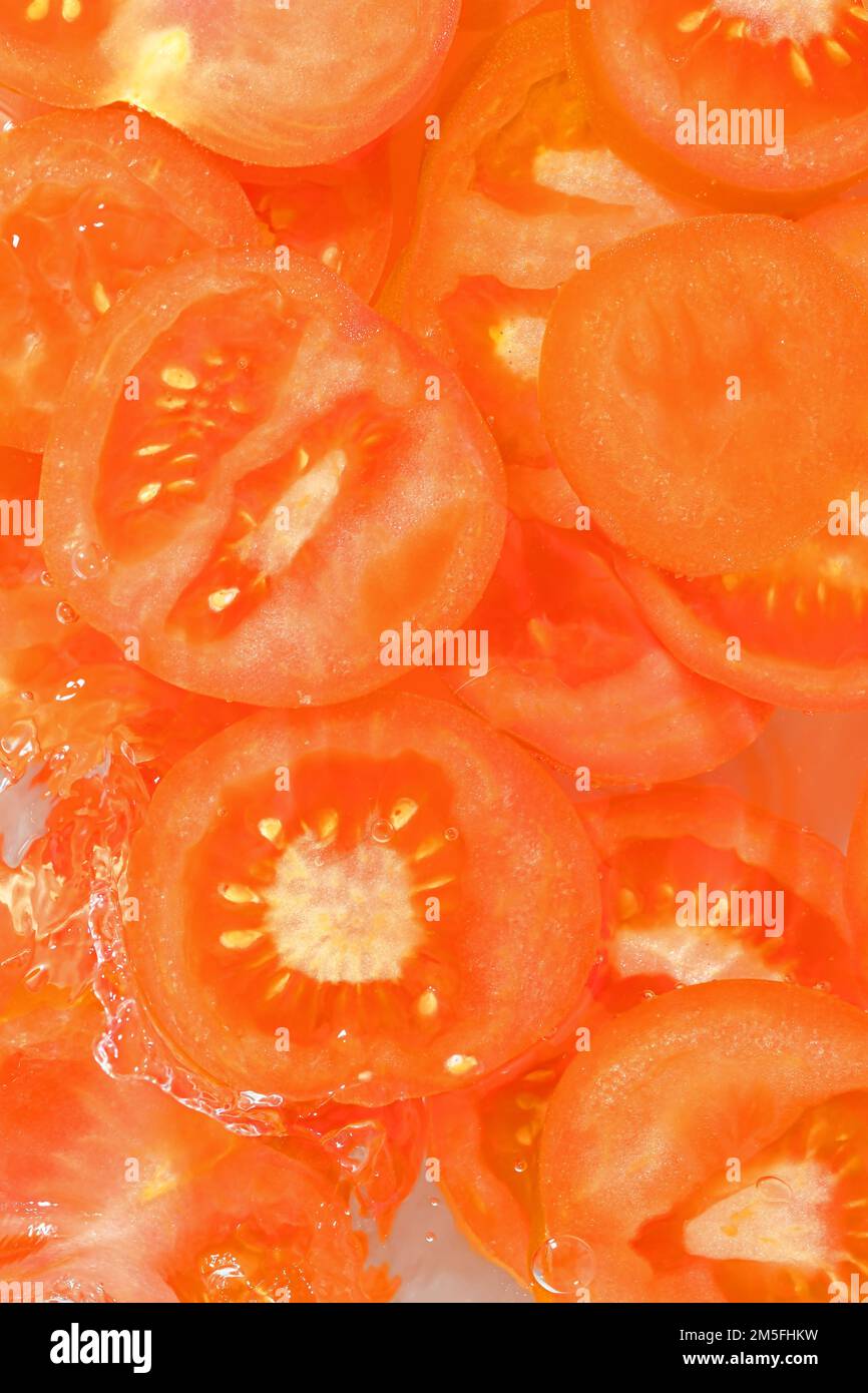 Close-up fresh slices of juicy tomato on white background. Slices of ...