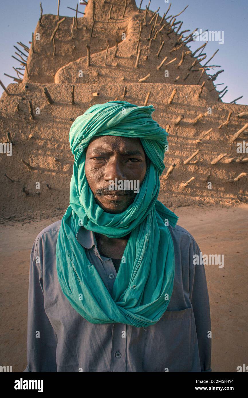 African man with turban in front of the Tomb of Askia in Gao, Mali ...
