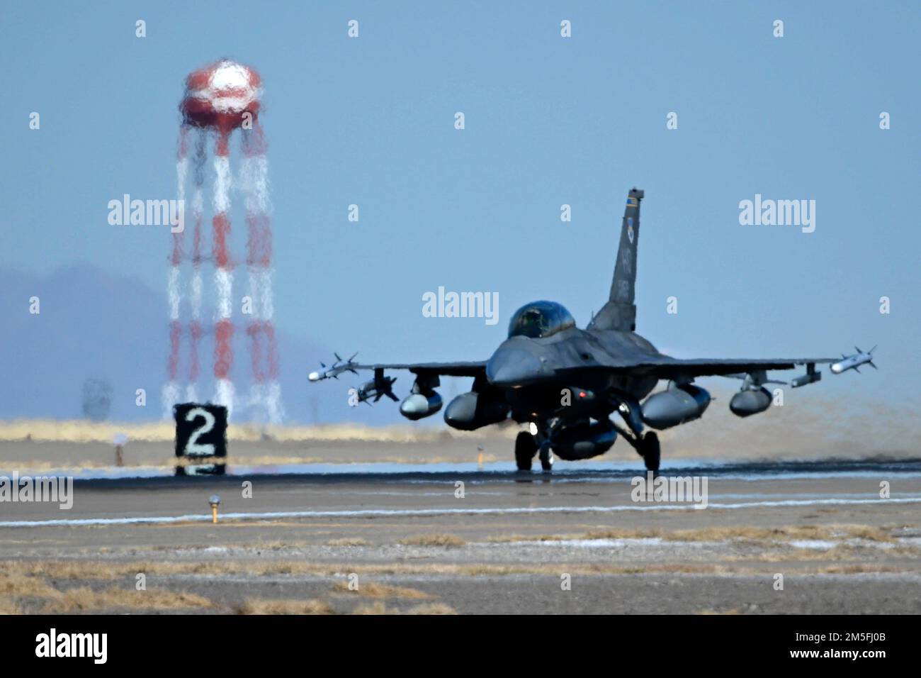 An F-16 Viper assigned to the 311th Fighter Squadron, makes its way ...