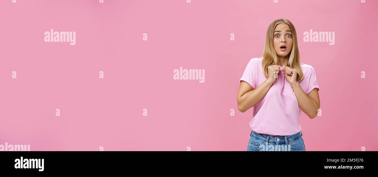 Woman gasping from fright being scared by someone pressing clenched ...