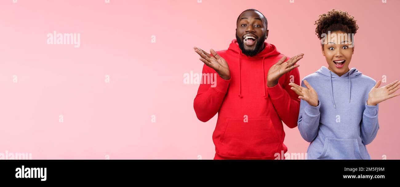 Impressed happy thrilled young pair african man woman relationship ...
