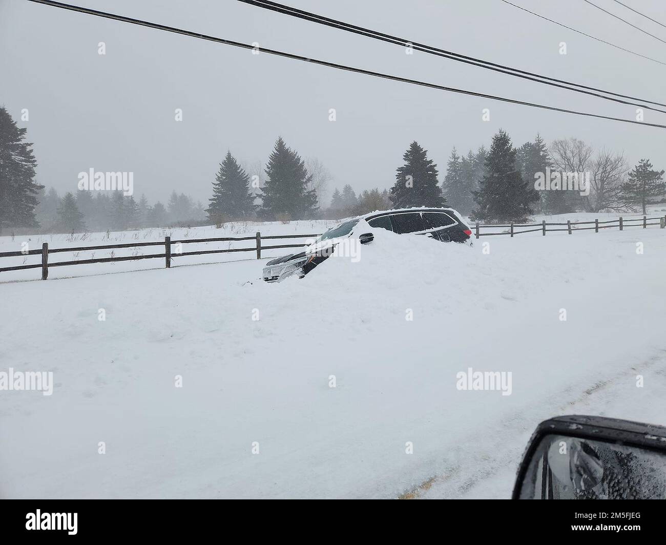 Lancaster, New York, USA. 24th Dec, 2022. A vehicle is stuck in the ...