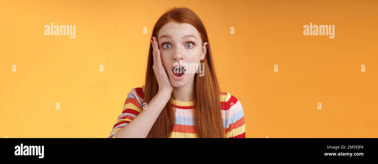 Shocked impressed concerned ginger girl drop jaw gasping stunned slap ...