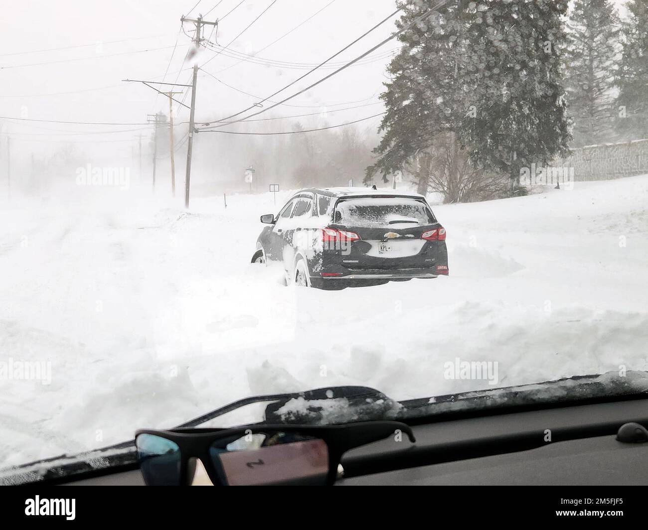 Lancaster, New York, USA. 24th Dec, 2022. A car is stuck in the snow ...