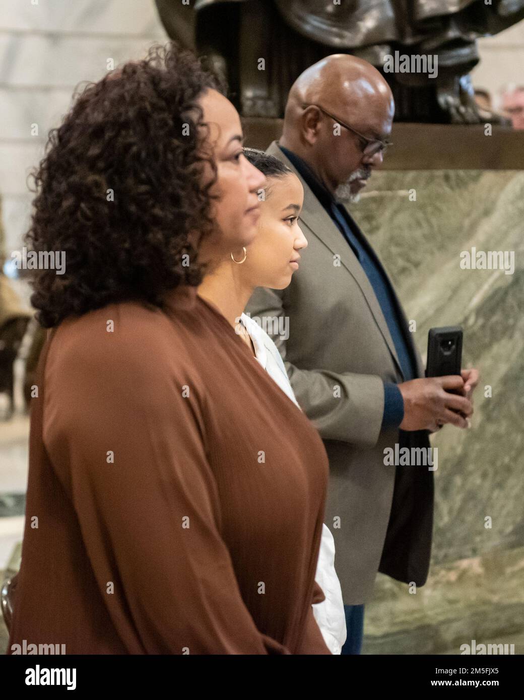 Family members attend the promotion ceremony of Maj. Gen. Charles M ...
