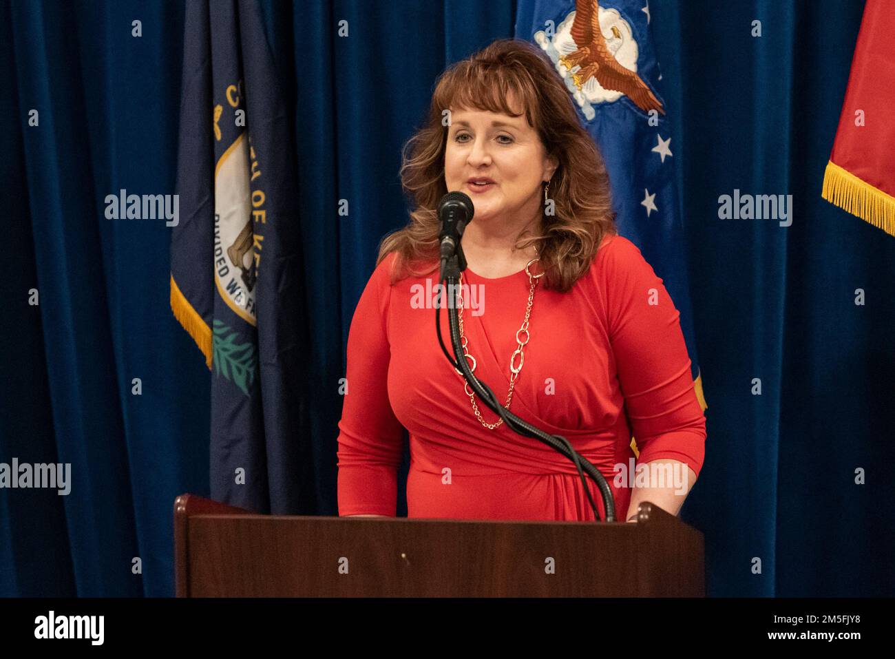 April Brown performs the National Anthem during a promotion ceremony ...