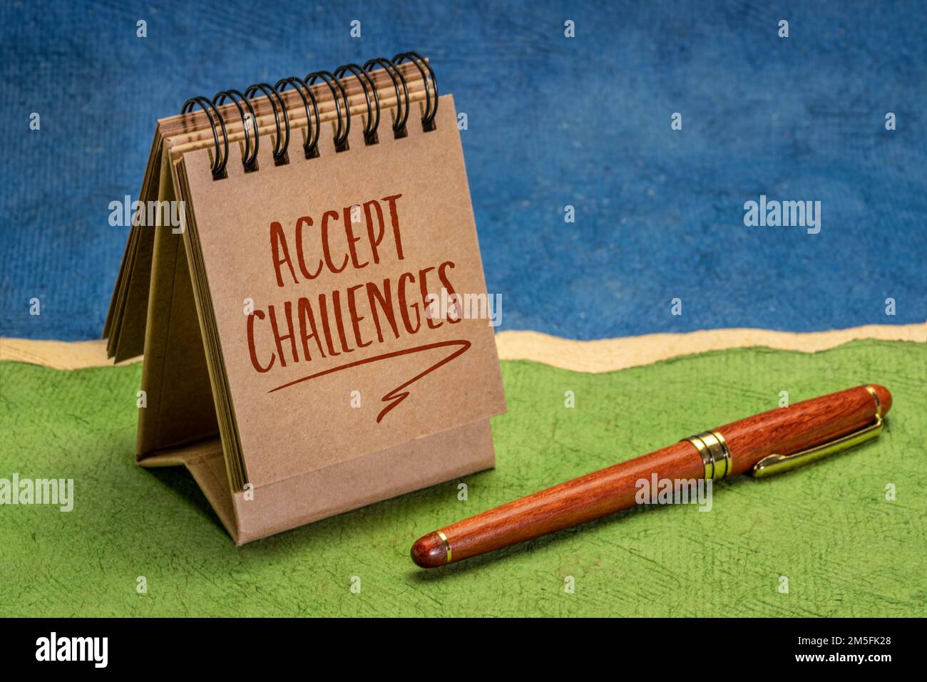 accept challenges motivational note or reminder in a small desktop ...