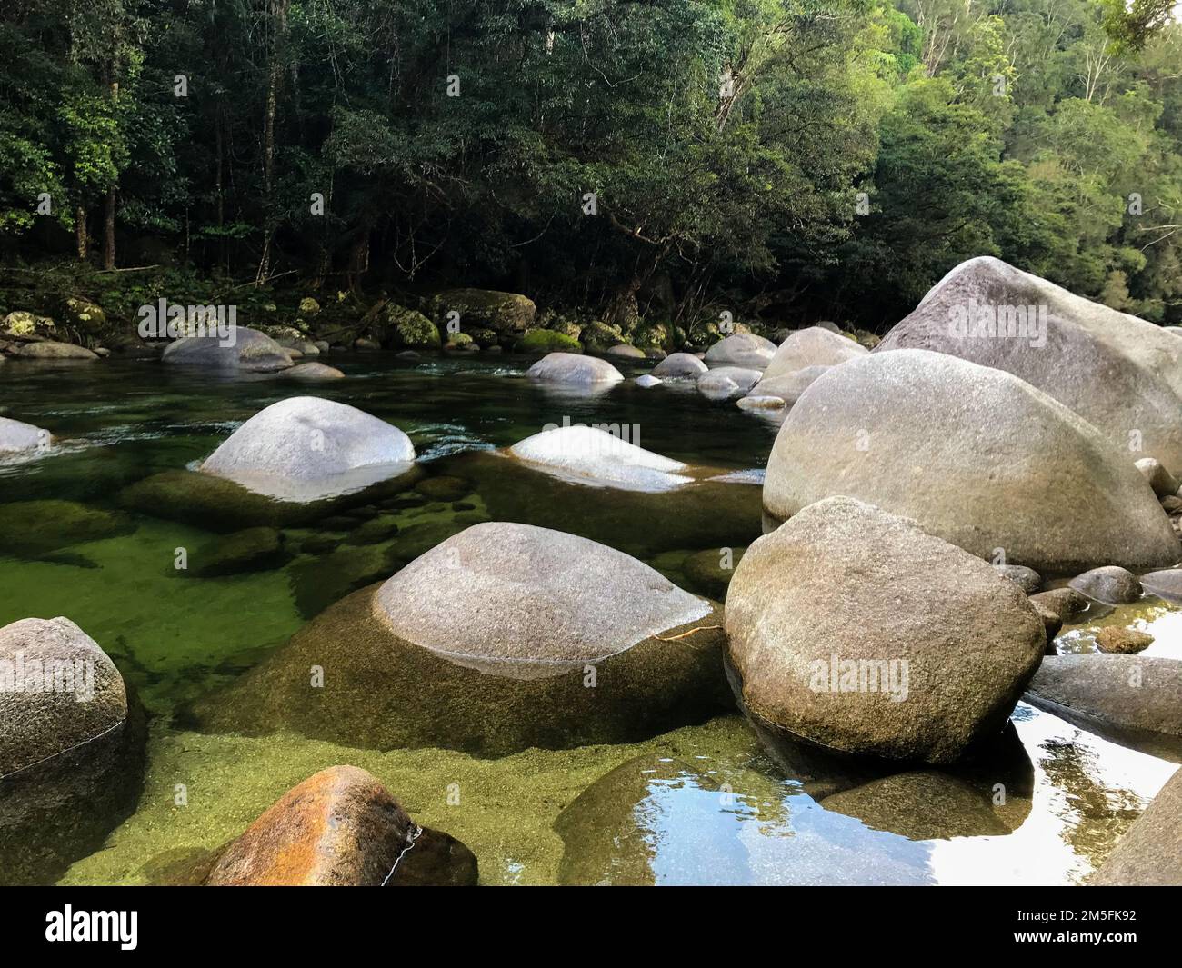 A small river with big stones Stock Photo - Alamy