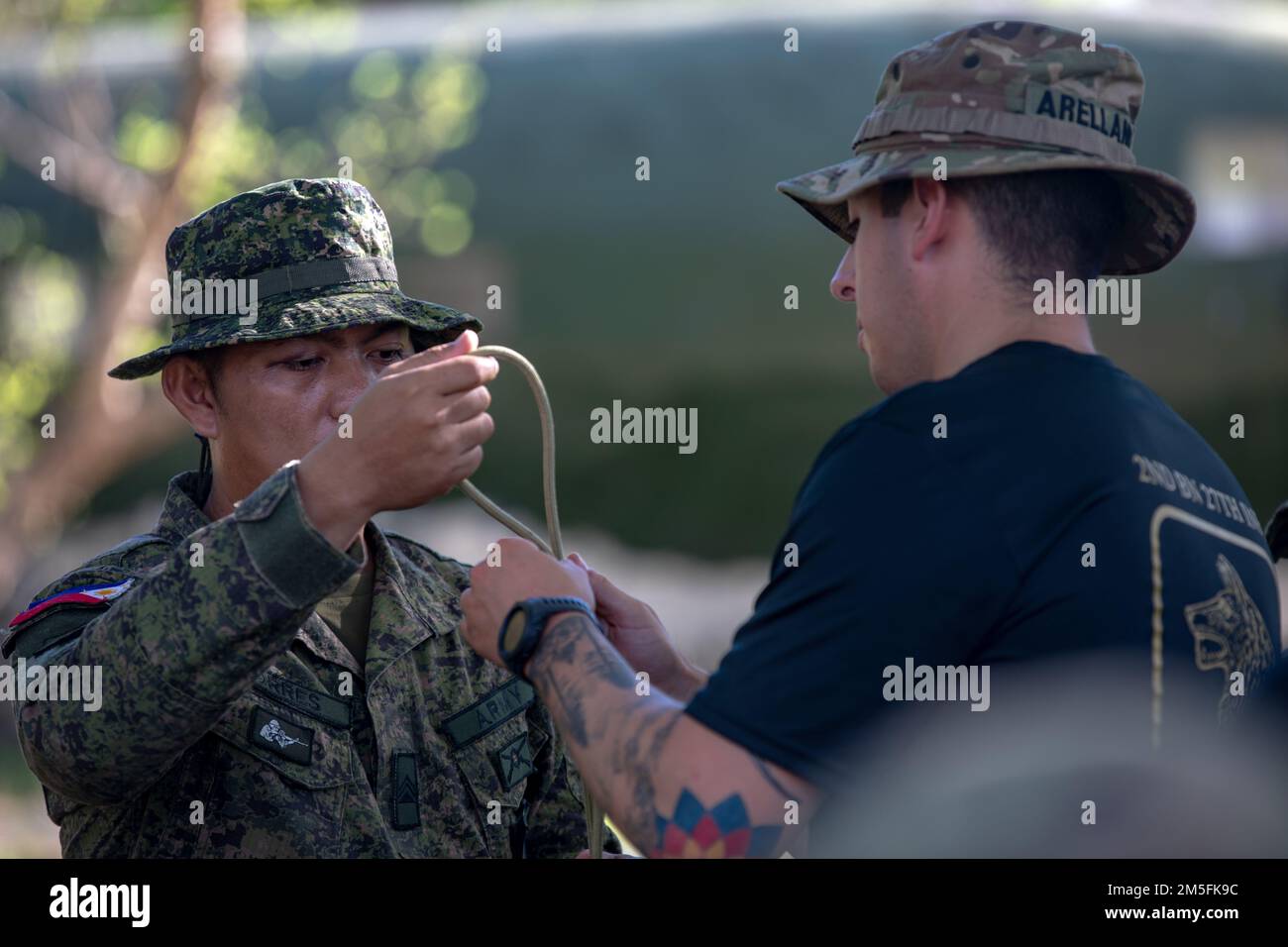 A Philippine Army Soldier practices various knots as part of the Jungle ...