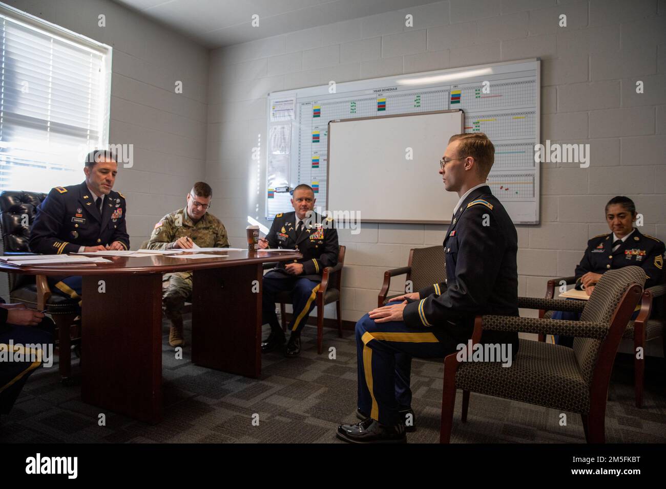 U.S. Army 2nd Lt. Caleb Smith (second from right), a military ...