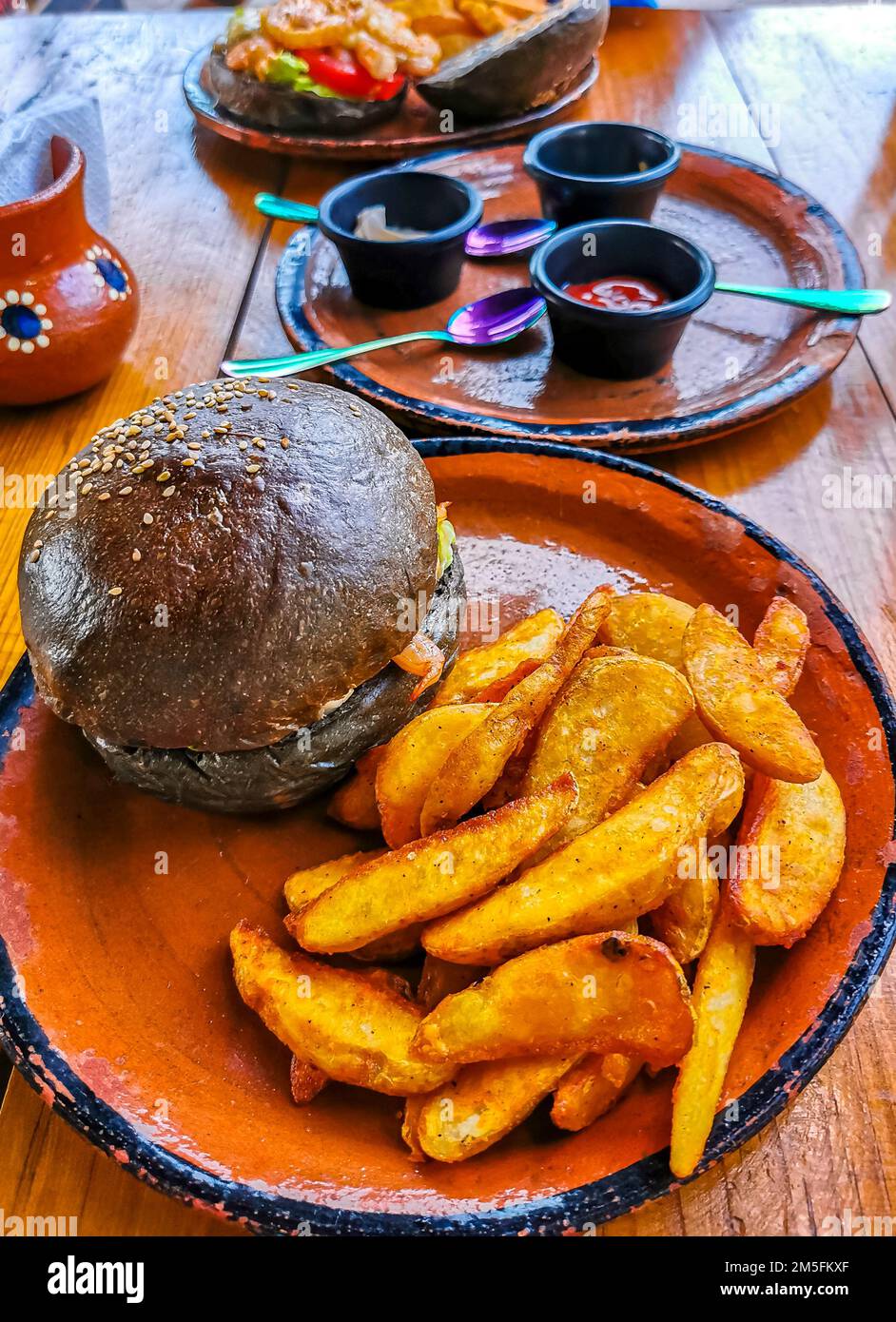 Fast food in the restaurant hamburger and fries in Playa del Carmen ...