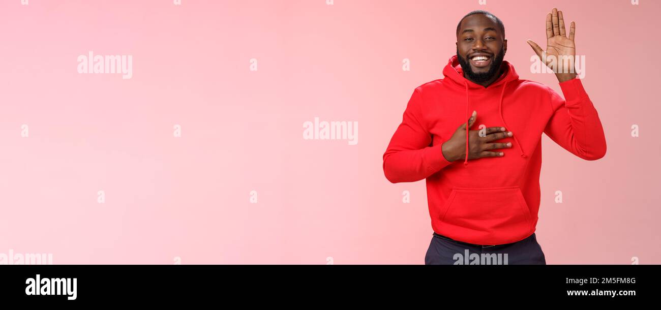 Smiling friendly african-american sincere man raise palm hold hand ...