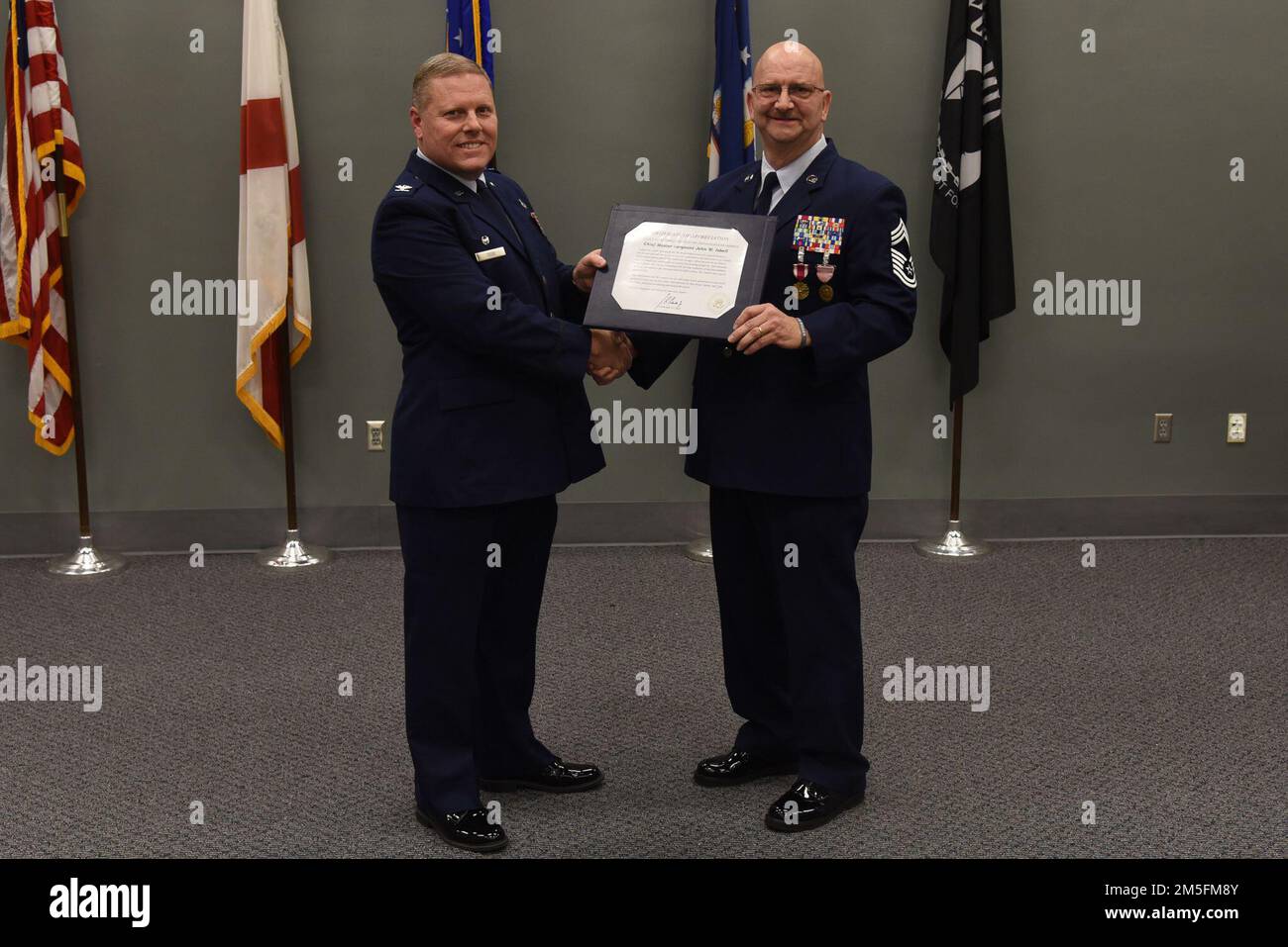 Members of the 117th Air Refueling Wing attend Chief Master Sgt. John ...