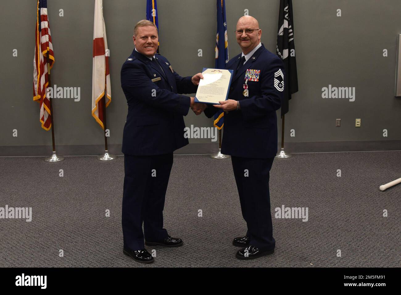 Members of the 117th Air Refueling Wing attend Chief Master Sgt. John ...