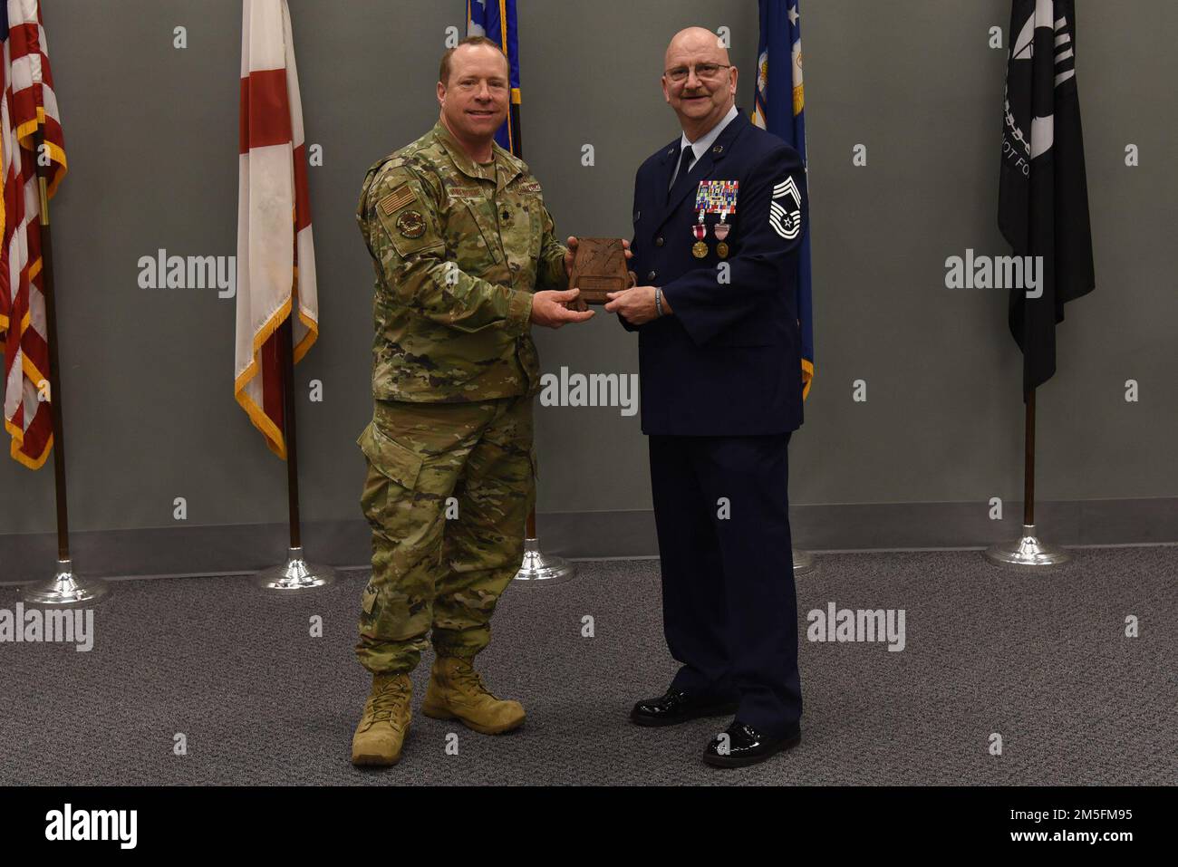 Members of the 117th Air Refueling Wing attend Chief Master Sgt. John ...