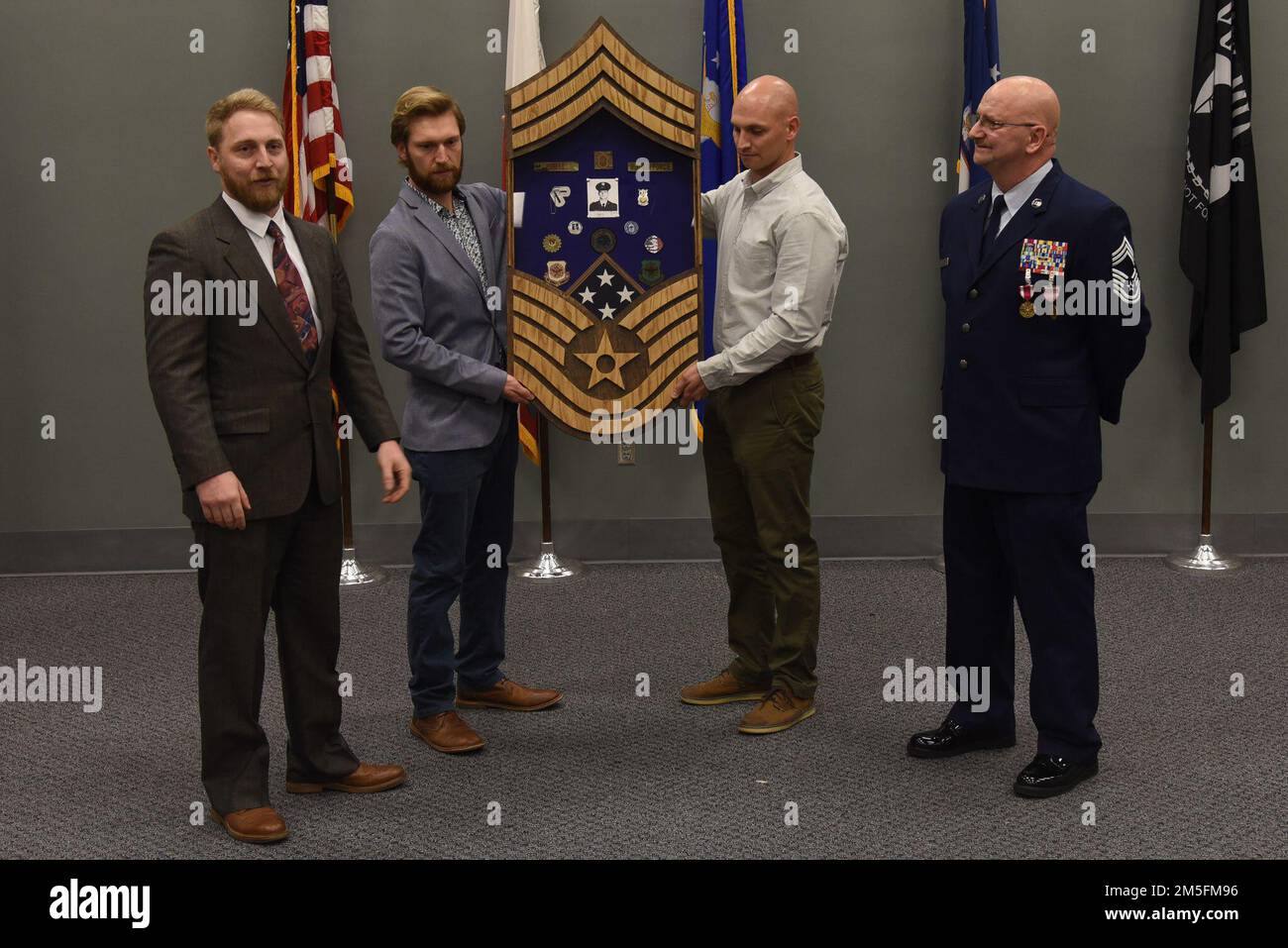 Members of the 117th Air Refueling Wing attend Chief Master Sgt. John ...