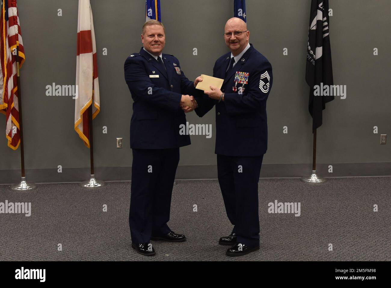Members of the 117th Air Refueling Wing attend Chief Master Sgt. John ...